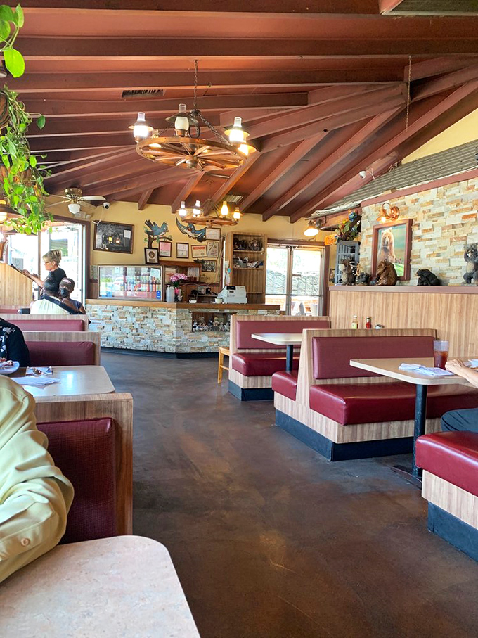 Red vinyl booths, wagon wheel chandeliers, and wood-paneled walls&mdash;this isn't trendy design, it's barbecue authenticity frozen in delicious time.