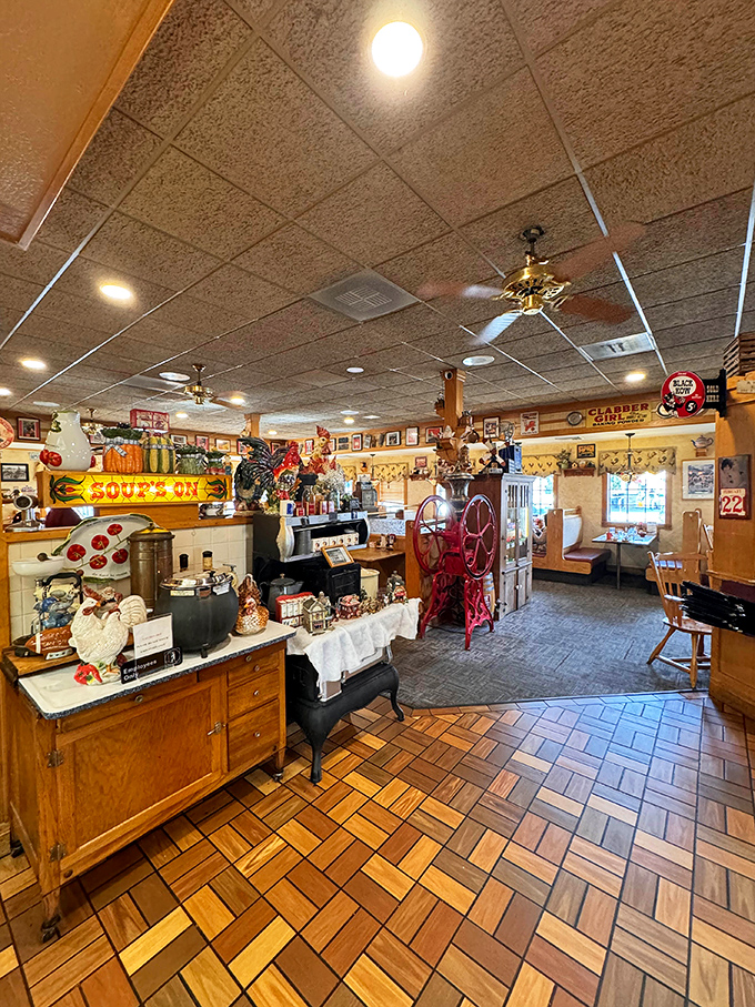 Nostalgia served daily. The interior's wooden parquet floors and rooster-themed decor create the perfect backdrop for serious comfort food indulgence.