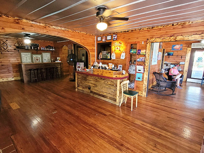 Where wooden planks tell stories and ceiling fans keep seafood secrets. The rustic interior feels like stepping into a fisherman's living room&mdash;one that happens to serve incredible food.