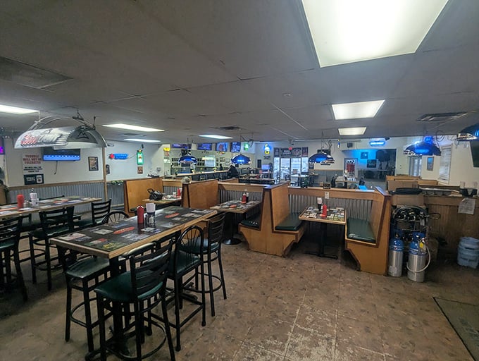 Step inside and you're greeted by the warm glow of neon beer signs and the comforting sight of wooden booths&mdash;a dining room that says "stay awhile."