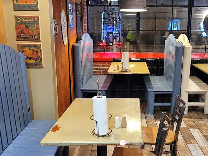 Those blue picket-style booth dividers aren't just charming design choices&mdash;they're creating little neighborhoods of barbecue bliss throughout the dining room.