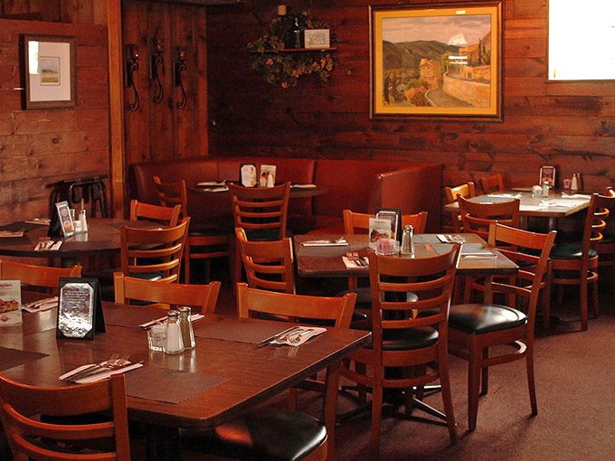 Warm wood paneling, comfortable chairs, and tables set for serious eating—this isn't Instagram-bait dining, it's the real deal.