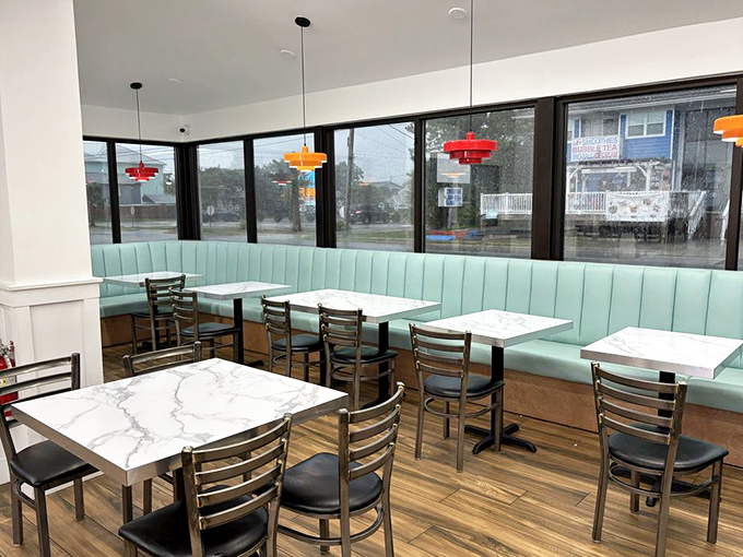 Clean, bright, and ready for burger warfare &ndash; where seafoam green booths witness daily battles between humans and impossibly large sandwiches.