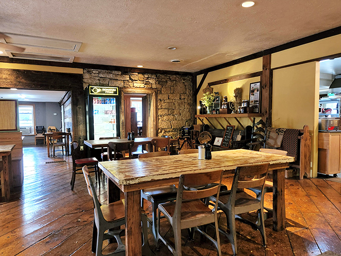 Wide-plank floors that have seen generations of happy diners, stone walls that could tell stories, and tables that invite you to linger. Rustic perfection.