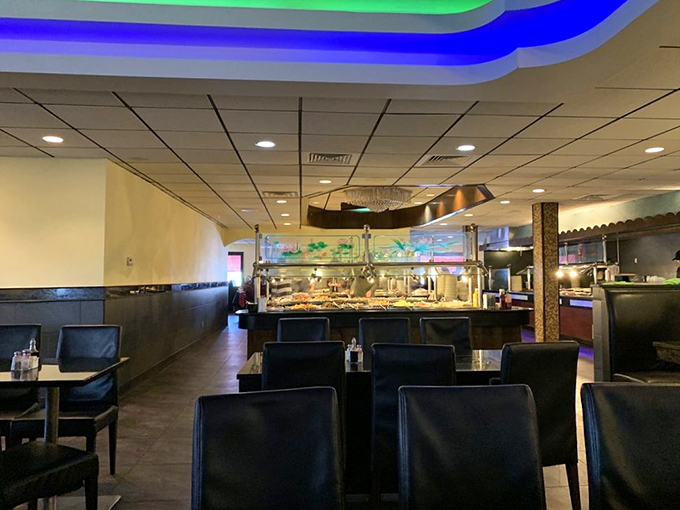 Blue neon casts a celestial glow over the dining room, as if the buffet stations are altars where hungry pilgrims come to worship.