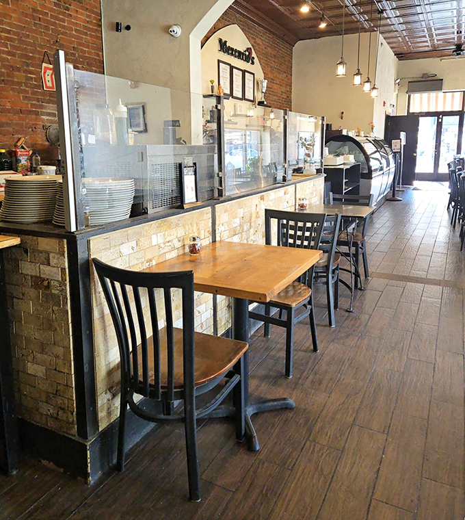 Inside, exposed brick walls and wooden tables create that perfect "why yes, I did discover this gem before everyone else" atmosphere.