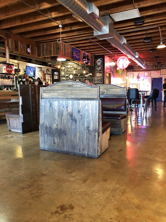 Wooden booths, exposed ductwork, and walls plastered with memorabilia &ndash; this isn't interior design, it's barbecue authenticity in its natural habitat.