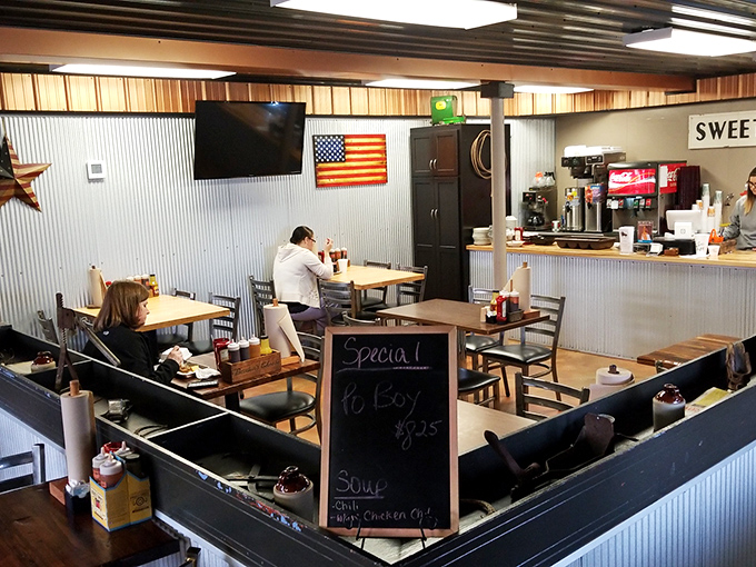 Inside, corrugated metal walls and simple wooden tables create that perfect "focus-on-the-food" atmosphere where memorable meals and conversations flourish.