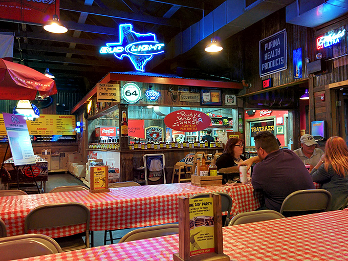 Step inside and you're transported straight to Texas. Neon signs, checkered tablecloths, and the promise of meat-filled happiness await.