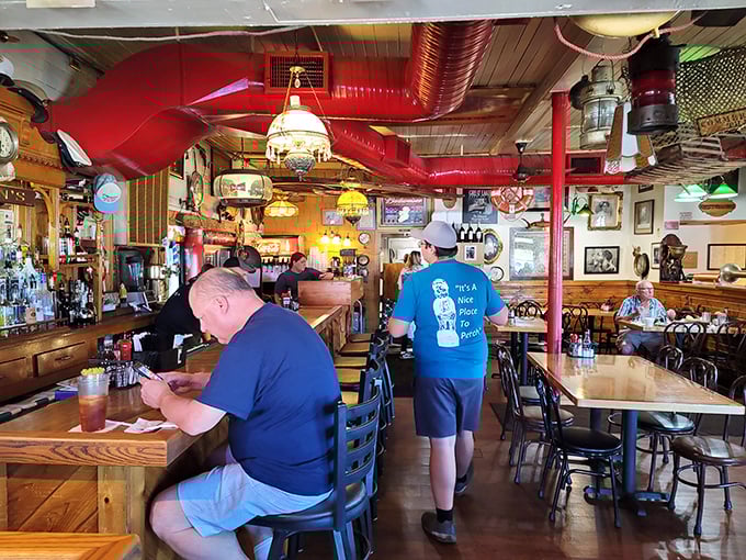 Nautical charm meets homestyle comfort inside Brennan's. Those red pipes aren't a design choice&mdash;they're honest architecture in a place that prioritizes substance over style.