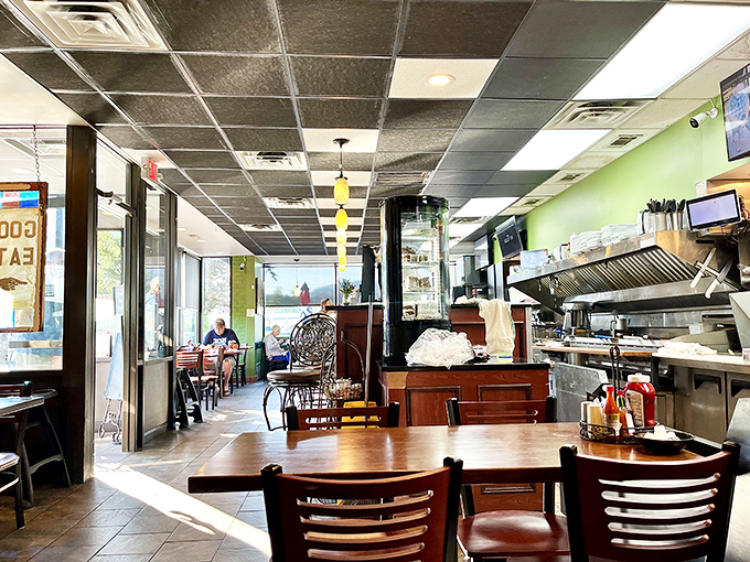 Sunlight streams through large windows, illuminating a space where memories are made one perfect breakfast at a time.