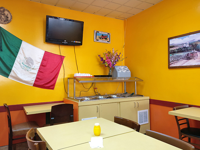 Sunshine-yellow walls and Mexican pride create the perfect backdrop for serious taco contemplation and family conversations.