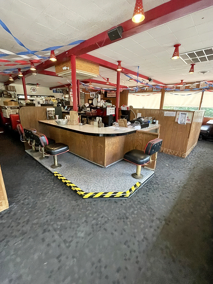 Counter culture at its finest&mdash;where swivel stools invite you to belly up to the heart of burger operations while festive streamers keep the mood perpetually celebratory.