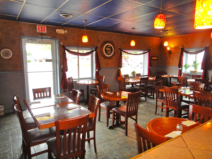 Warm orange walls, wooden tables, and pendant lighting create the perfect backdrop for the impending food coma you'll happily embrace.