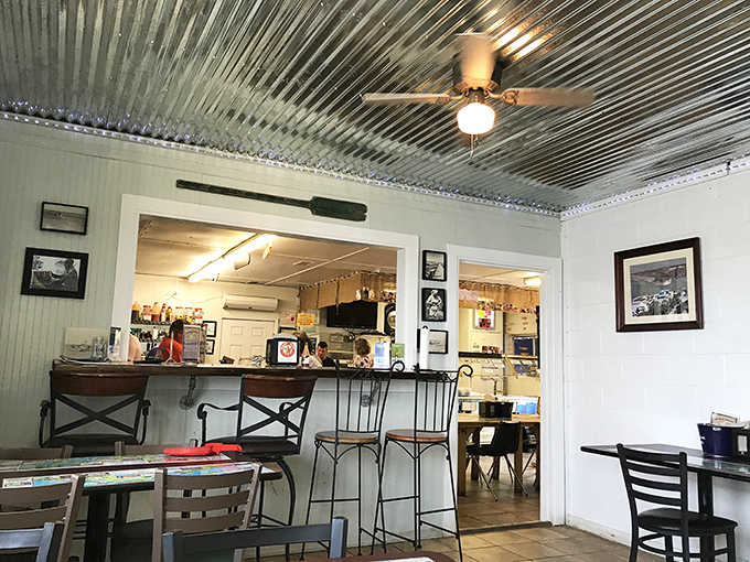 That corrugated metal ceiling has witnessed countless seafood epiphanies. Simple furnishings let you focus on what matters: the food on your plate.