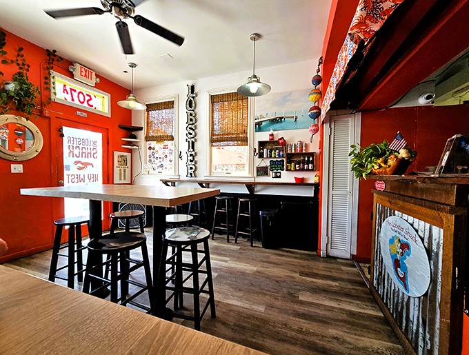 Inside, coral-red walls and nautical touches create the perfect backdrop for seafood indulgence. Like walking into a warm hug with a hint of sea salt.