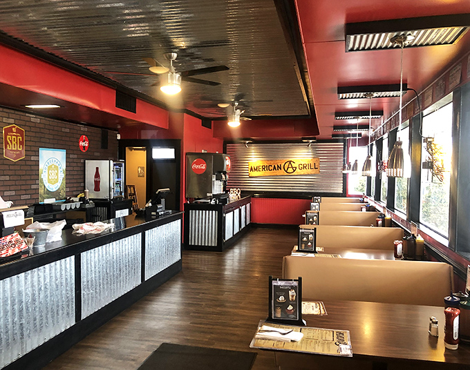 Red walls and corrugated metal create the perfect backdrop for serious barbecue conversations and even more serious eating.
