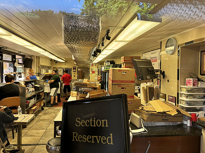 Where sandwich magic happens. The no-nonsense interior says everything you need to know: they're too busy making perfect food to worry about décor.