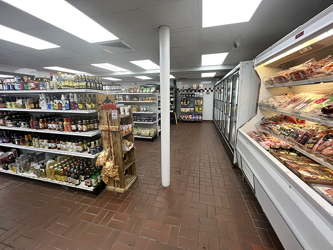 Grocery aisles that would make Neptune himself feel at home—specialty items flank one side while fresh catches beckon from refrigerated cases.