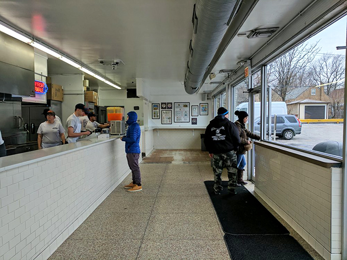 Where democracy lives: millionaires and mechanics wait in the same line for perfection.