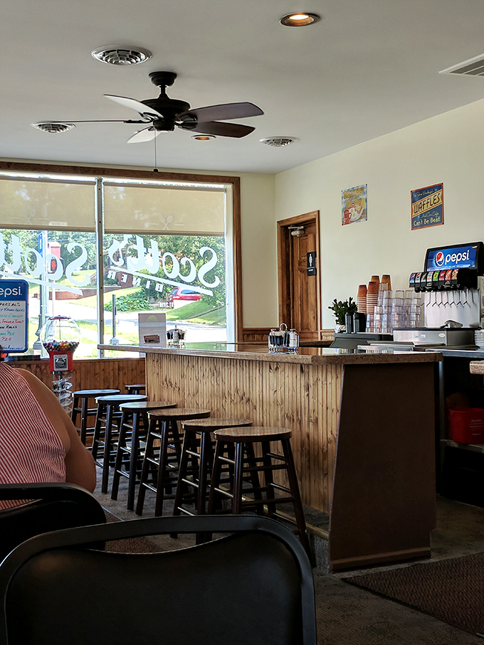 The "NO WAKE ZONE" sign isn't just clever decor&mdash;it's a philosophy. Slow down, savor each bite, and let the fishing photos tell their salty tales.