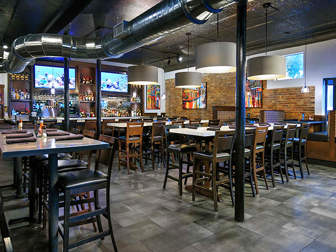 Industrial-chic meets Southern comfort in Harry's dining room, where exposed brick and ductwork create an atmosphere that's both upscale and "come as you are."