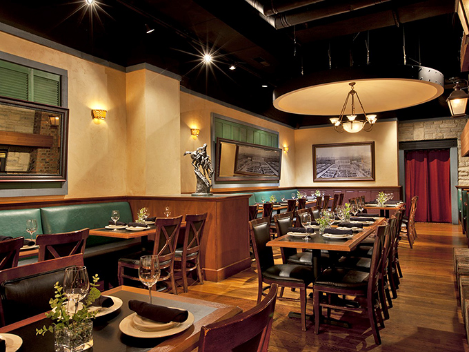Warm lighting, green leather booths, and rich wood tones create that perfect steakhouse ambiance&mdash;like a hug from an old friend who happens to be excellent at cooking.