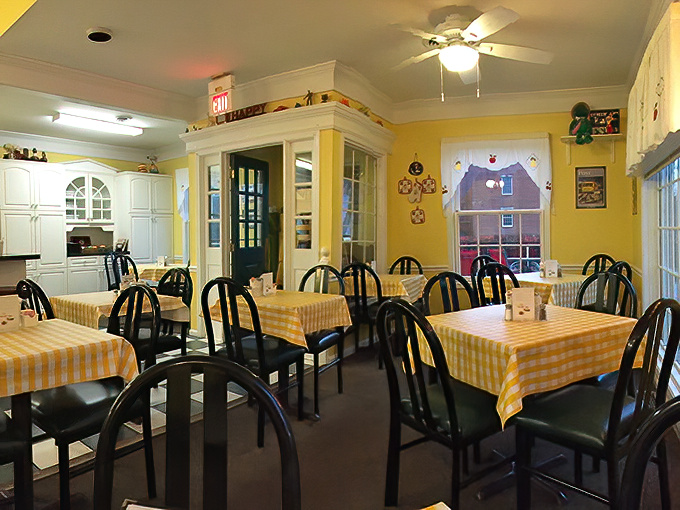 Sunny yellow walls and checkered tablecloths create that rare atmosphere where calories don't count and conversations flow as easily as coffee.