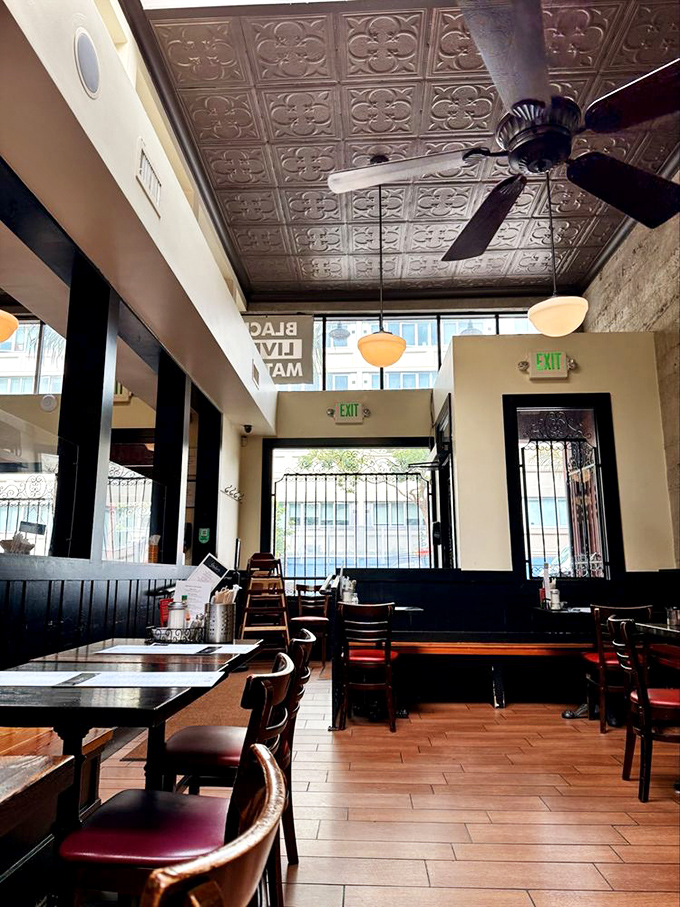 Ornate tin ceiling tiles and warm wooden accents create that perfect New Orleans ambiance &ndash; minus the humidity that would ruin your hairdo.