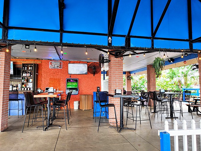 The open-air design lets Florida's famous sunshine pour in while string lights stand ready for when the evening mood shifts from "beach day" to "date night."