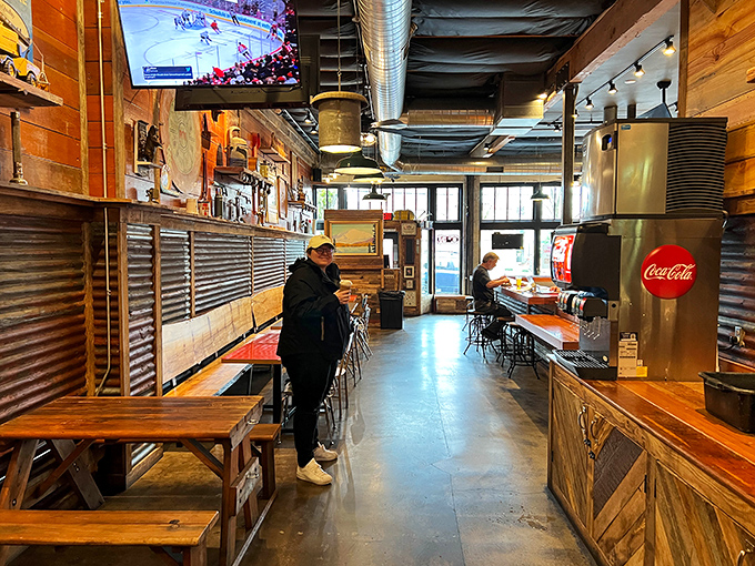 Inside, rustic wood meets industrial chic in a space that feels like your coolest friend's garage&mdash;if that friend happened to be a chicken-smoking genius.