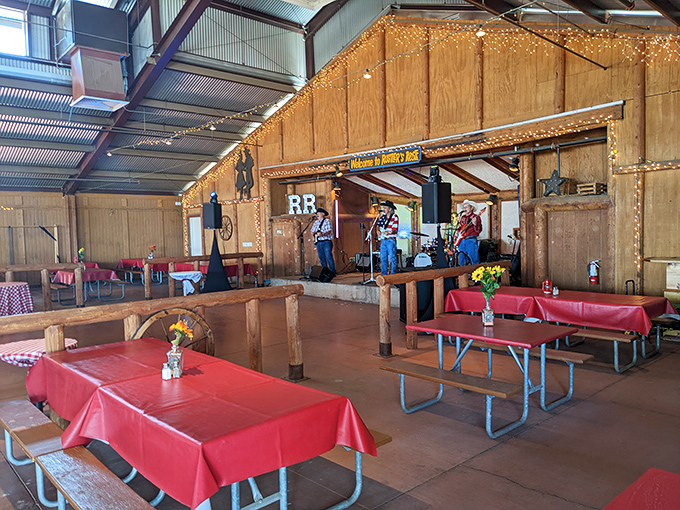 Red checkered tablecloths and rustic charm create the perfect backdrop for serious carnivorous adventures ahead.
