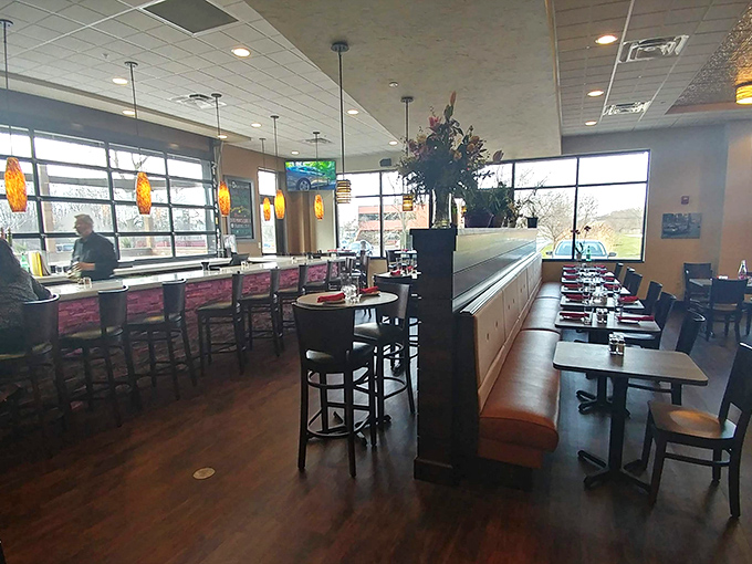 Inside, warm wood tones and comfortable seating create that perfect "why don't we stay for one more glass of wine" atmosphere.