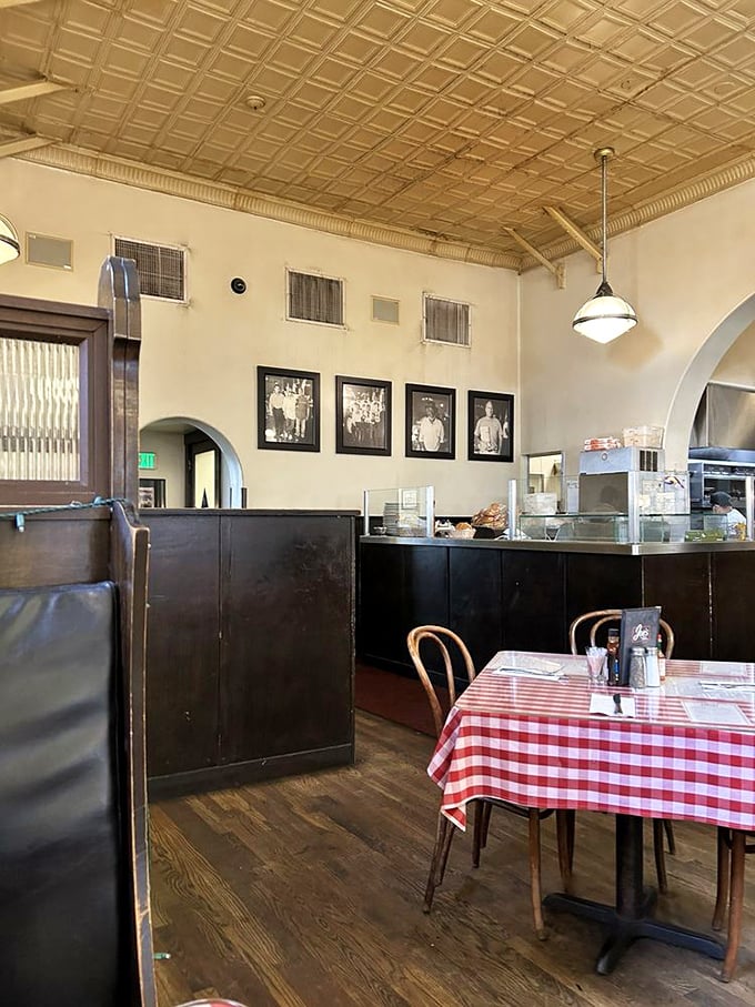 High tin ceilings, classic wooden booths, and red checkered tablecloths&mdash;this isn't retro by design, it's authentic by persistence.