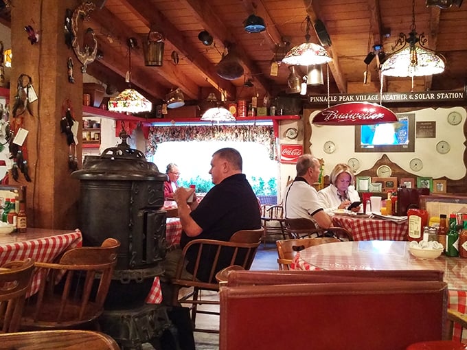 Time travel isn't science fiction when you step inside—it's just Tuesday at the General Store, where pot-bellied stoves and checkered tablecloths reign supreme.