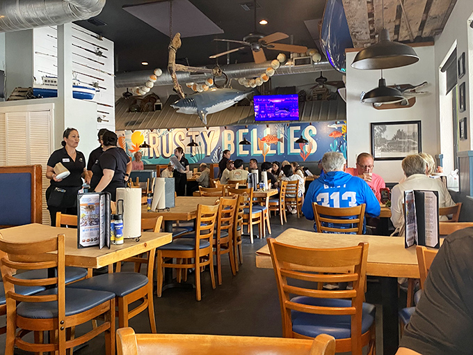Inside, nautical charm meets serious seafood business. That shark overhead isn't just decoration&mdash;it's keeping an eye on who orders the freshest catch.