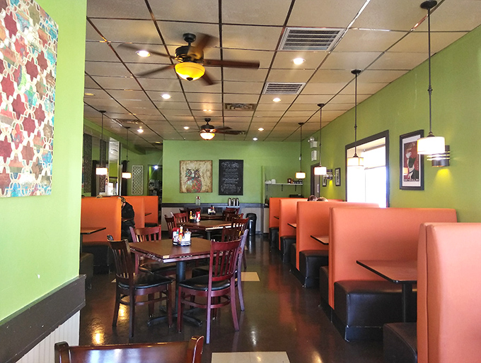 Lime green walls and coral booths create a cheerful morning vibe that's more energizing than your first cup of coffee.