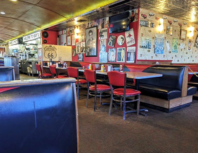 Tiffany-style lamps cast a warm glow over wooden beams and nautical decor, creating the perfect backdrop for seafood indulgence.