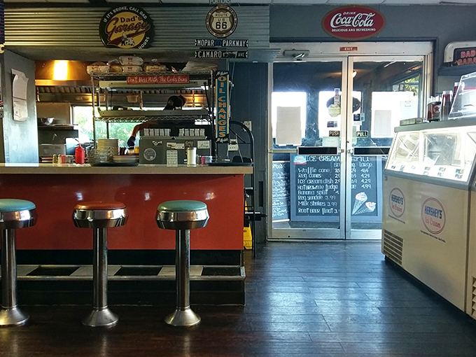 Classic counter seating where conversations flow as freely as the coffee, complete with Route 66 signs that'll fuel your road trip nostalgia.
