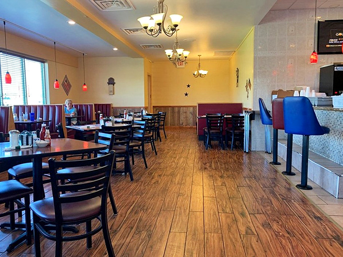 Wood floors, burgundy booths, and just enough space between tables to keep your pancake enthusiasm from disturbing neighboring diners.
