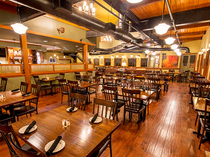 Warm wooden tones and exposed beams create that perfect "fancy but not too fancy" vibe where you can actually hear your dinner companions.