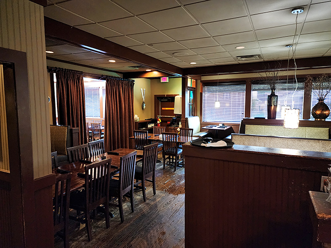 Warm wood tones and comfortable seating create that perfect "everybody knows your name" atmosphere where conversations flow as freely as the coffee.