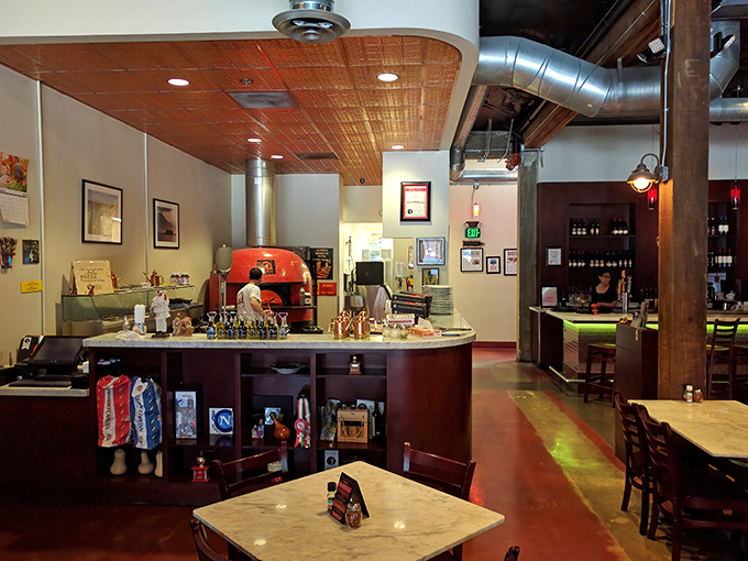 Inside, wooden picnic tables and an open-air design create the perfect "no shoes, no shirt, no problem" vibe that's increasingly rare in today's polished Florida.