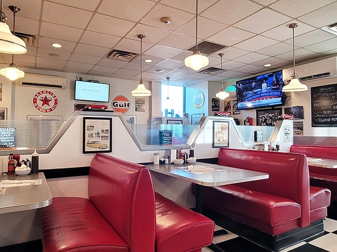 Rustic wooden tables meet playful chalk art in a dining room that feels like the coolest friend's kitchen&mdash;if that friend were a burger genius.