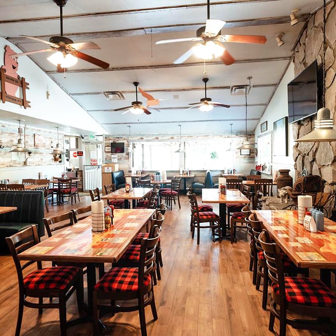 Red buffalo plaid chairs and wooden tables create that perfect "come as you are" atmosphere where the only dress code is an empty stomach.