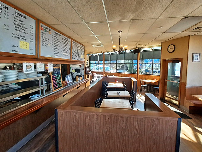 Wood-paneled booths and no-nonsense decor create the perfect stage where breakfast theater has played to satisfied audiences for decades.