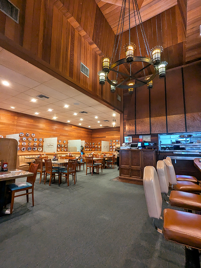 Soaring wooden ceilings and that magnificent chandelier create an unexpected lodge-like atmosphere that whispers, "Stay awhile, the pancakes are worth it."