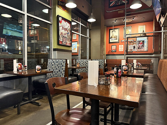 Step inside and you've entered a museum where nostalgia isn't behind glass&mdash;it's plastered on every available surface. The red ceiling adds that perfect diner glow.