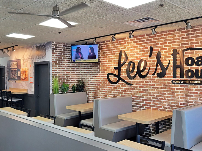 Exposed brick walls and comfortable booths create that perfect "focus-on-the-food" atmosphere where sandwich dreams come true.