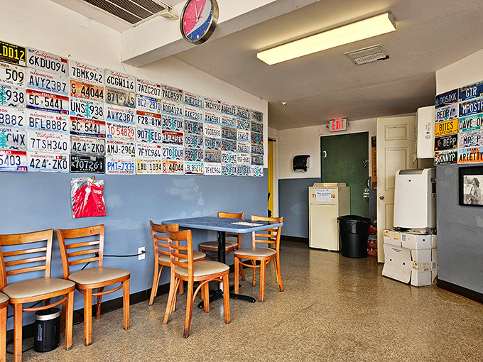 License plates cover the walls like a road trip hall of fame, creating an unpretentious atmosphere where the food, not the decor, takes center stage.